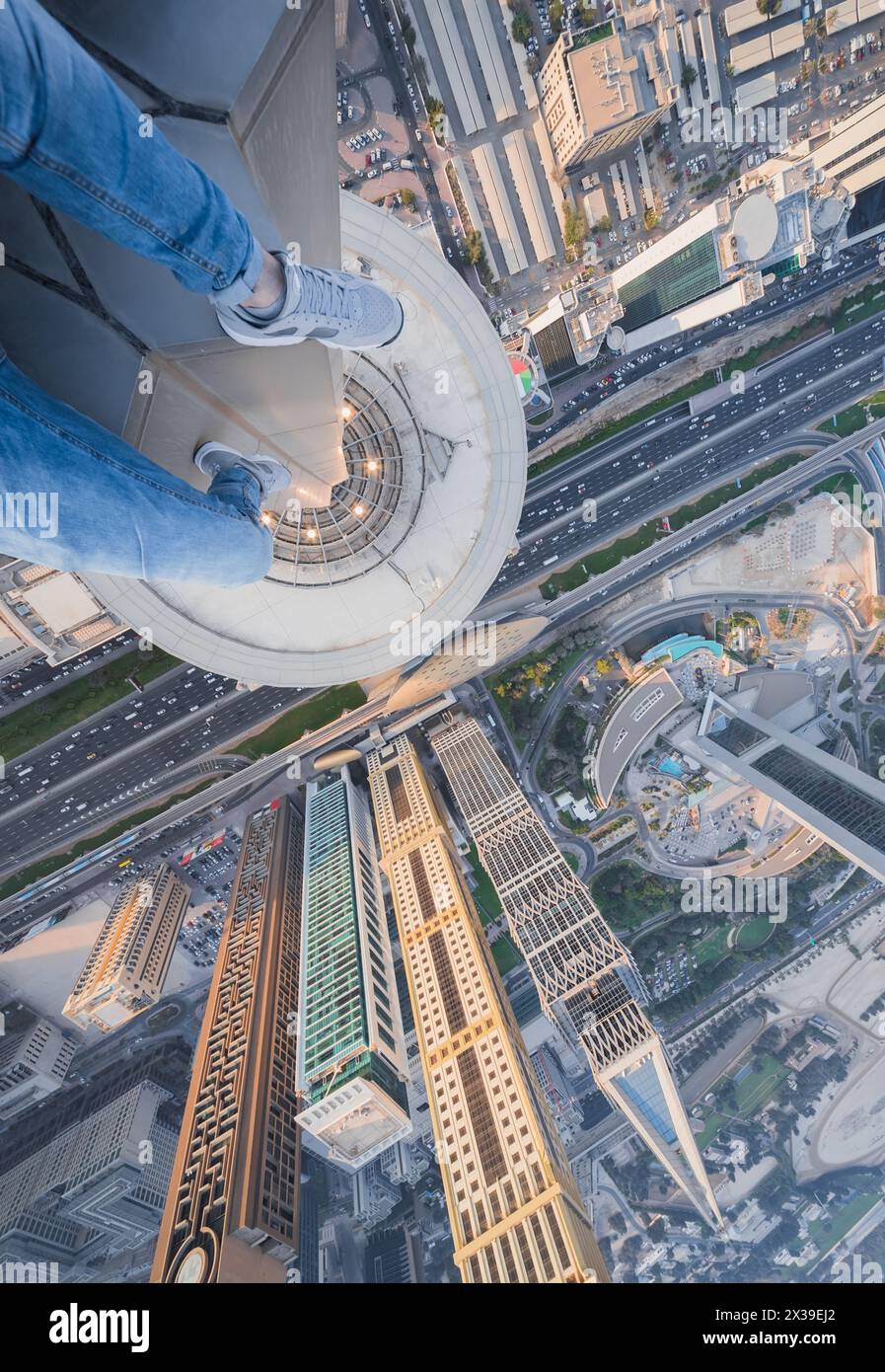 Male legs of rooftop of Millennium Plaza Hotel Dubai on Sheikh Zaid ...