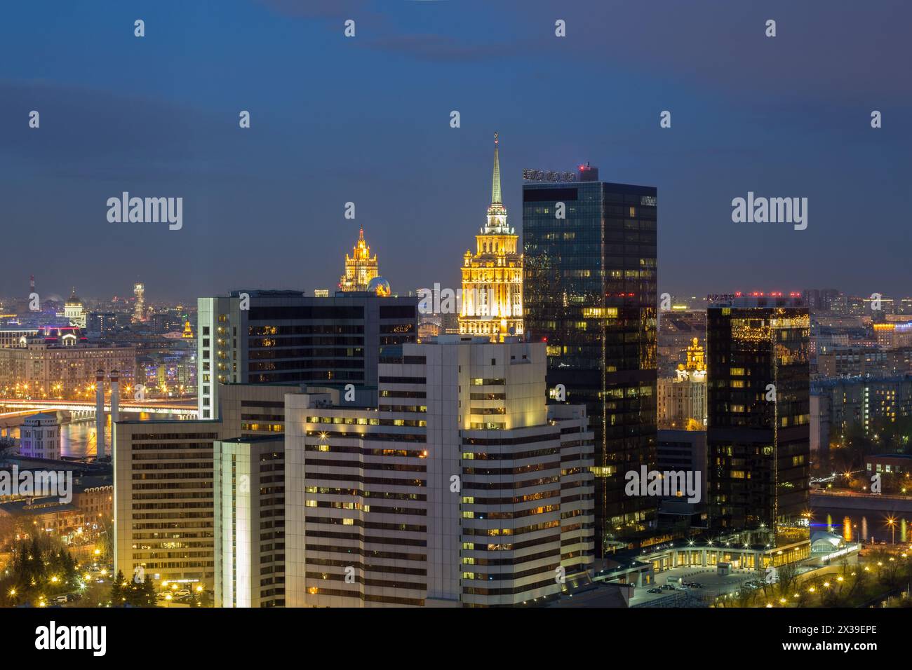 Tall buildings and illuminated stalin skyscrapers at night in Moscow ...