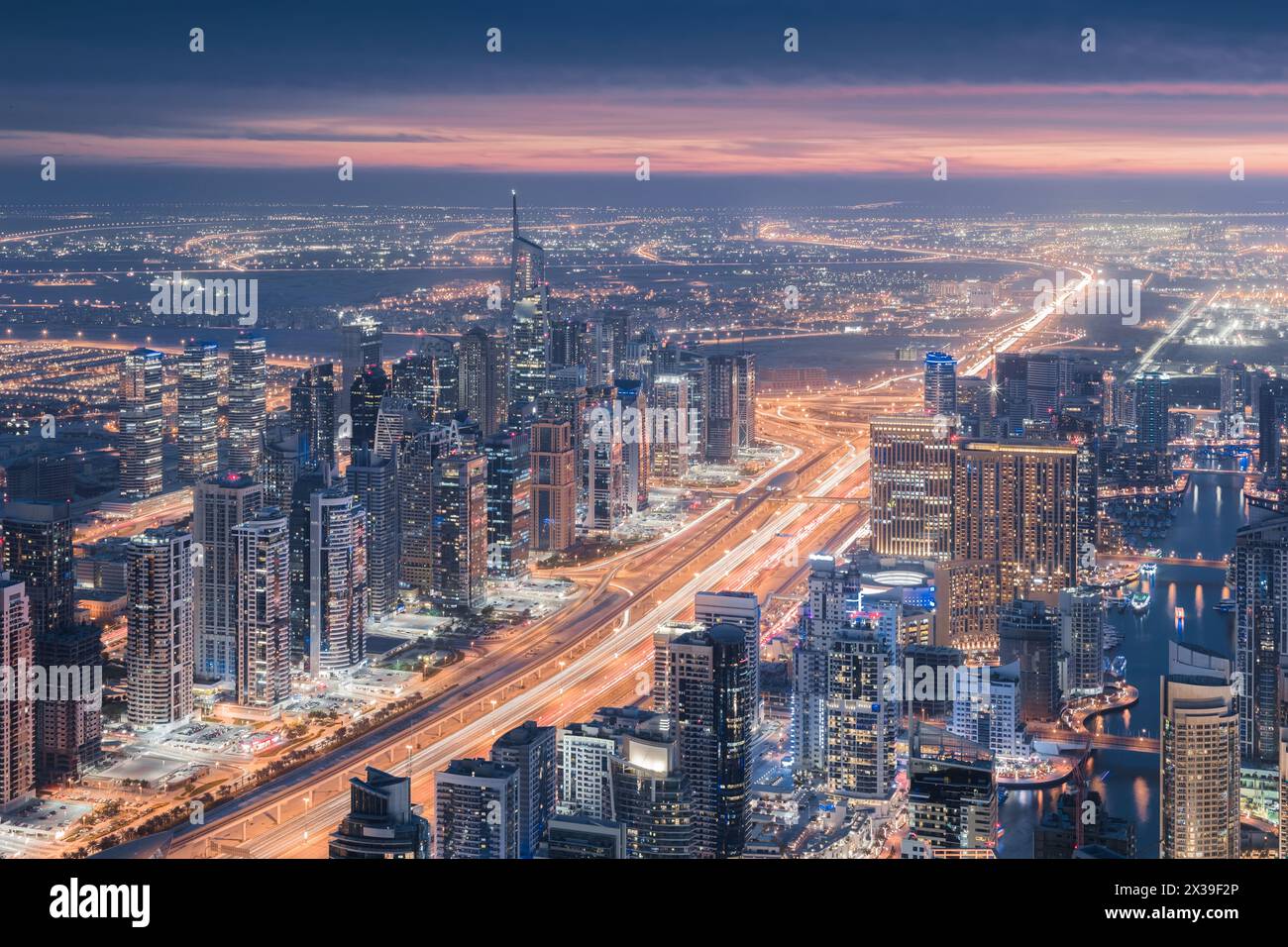 Skyscrapers of Dubai Marina area, Sheikh Zayed highway during sunset ...