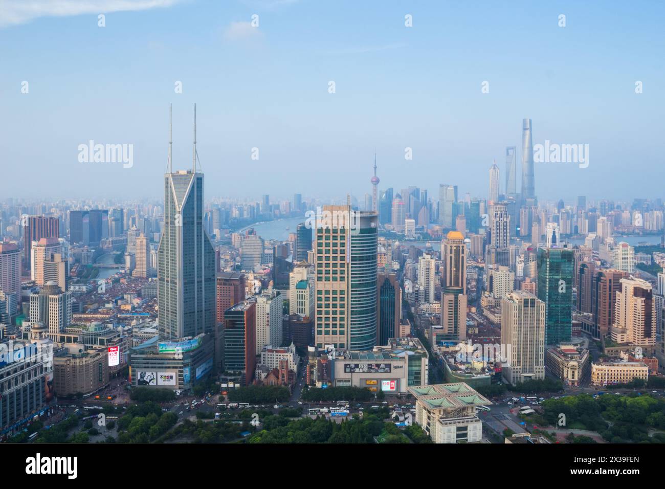 SHANGHAI - AUG 7, 2015: Shimao International Plaza among high buildings ...