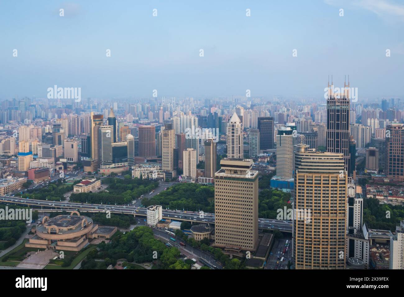 SHANGHAI - AUG 7, 2015: Tomorrow square among high buildings, 990 ...