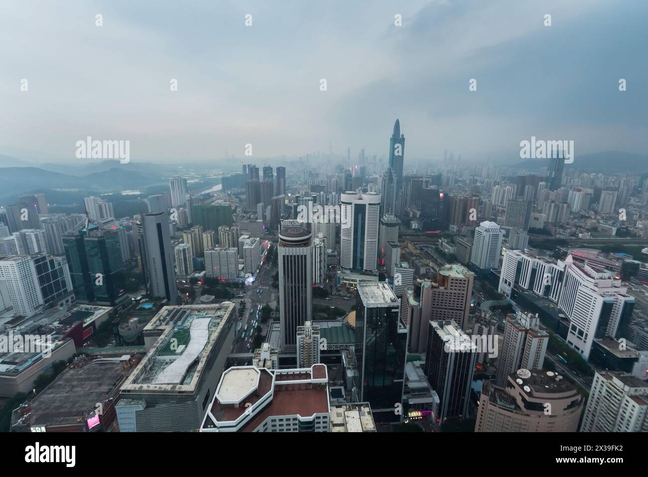 Skyscrapers in business district, football field of rooftop, view from ...