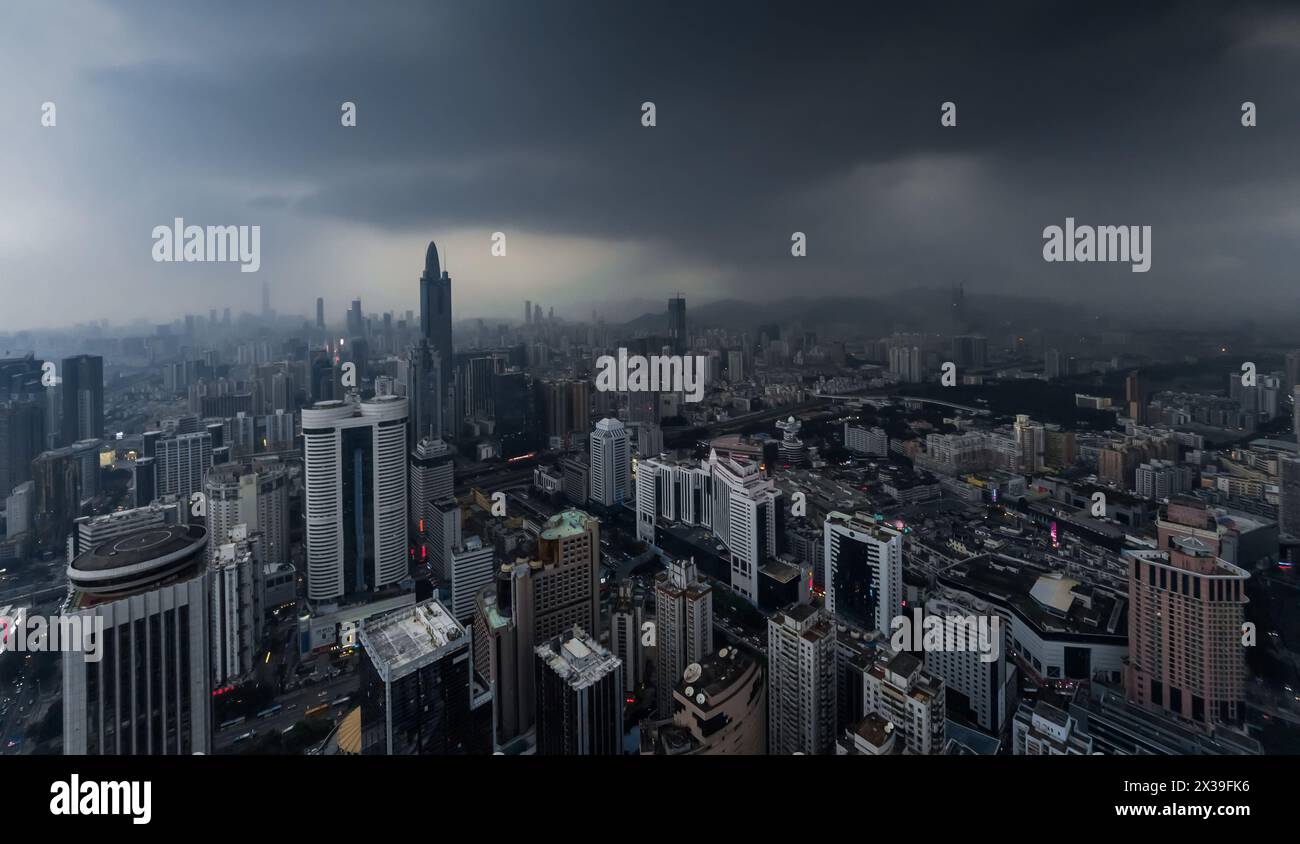 Skyscrapers and dark stormy sky, view from Panglin Plaza, Shenzhen ...