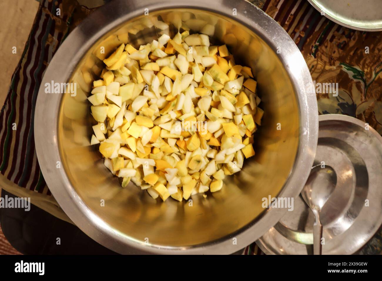 Indian popular dish Mango Pickle made of cube pieceg mango Stock Photo ...