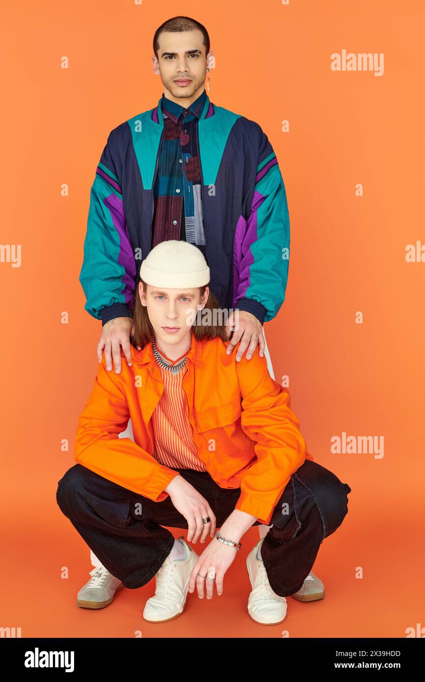 Two men standing together in a loving pose for a picture Stock Photo ...