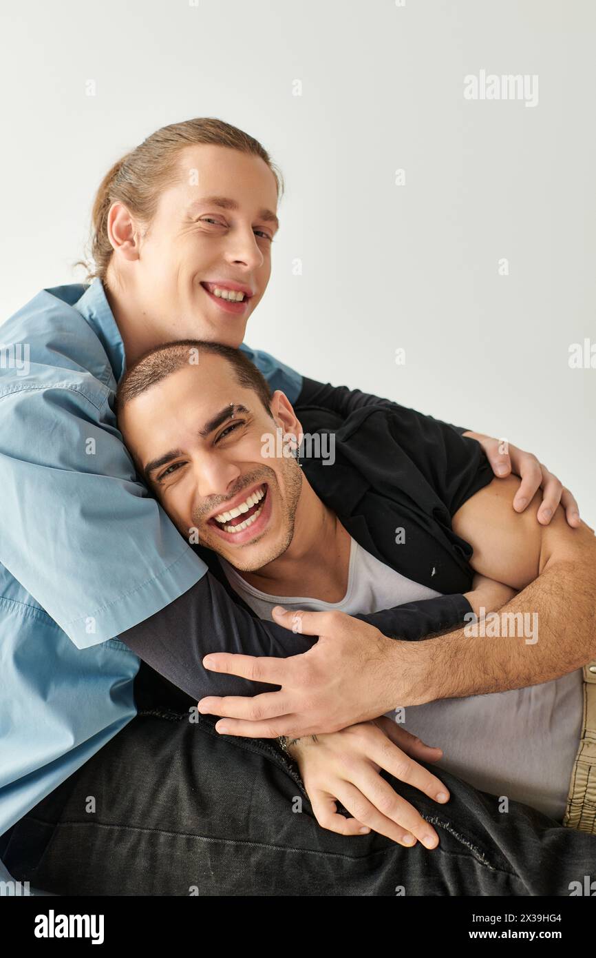 Gay men hugging hi-res stock photography and images - Alamy
