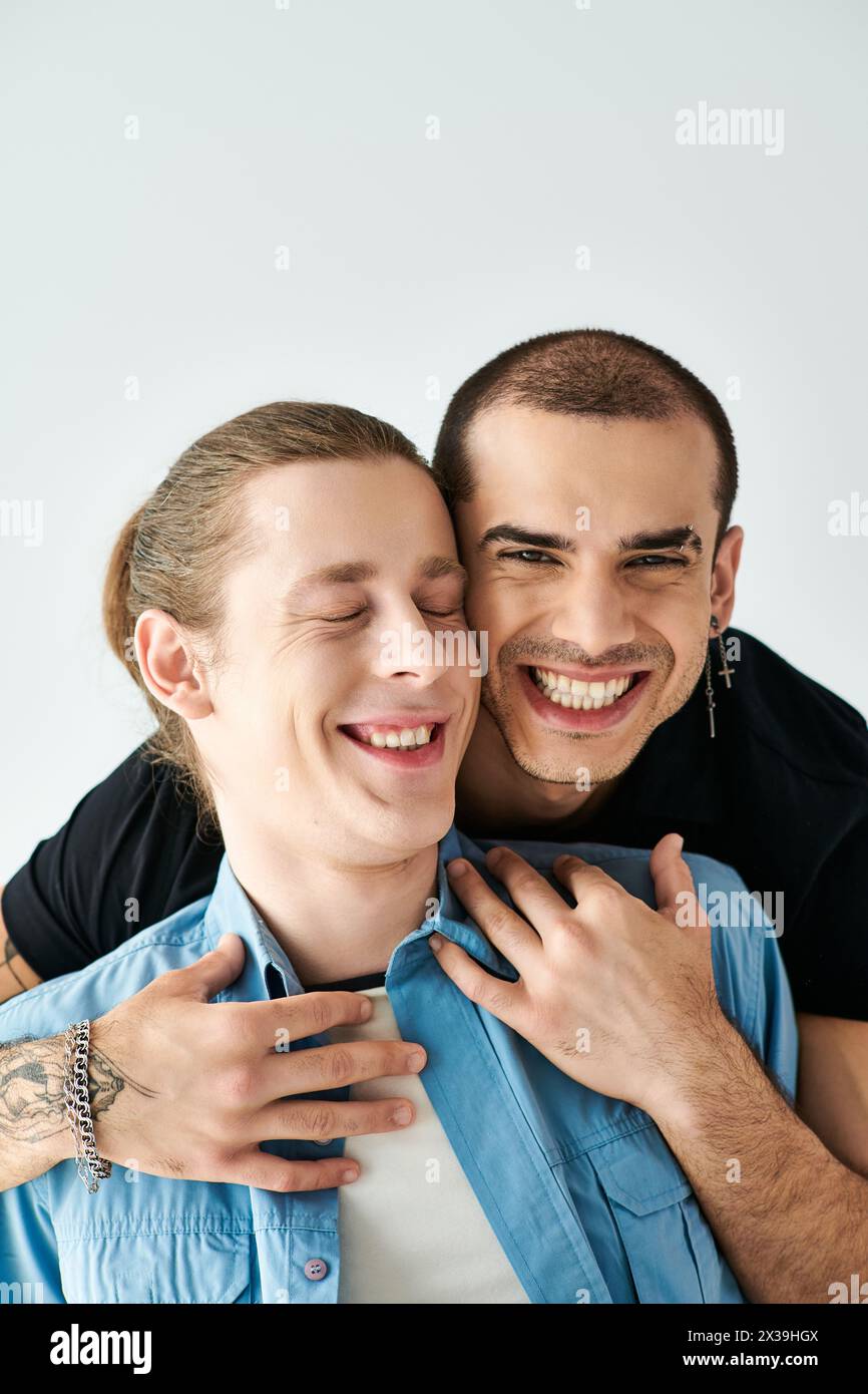 Two men share a warm embrace, expressing love and connection Stock ...