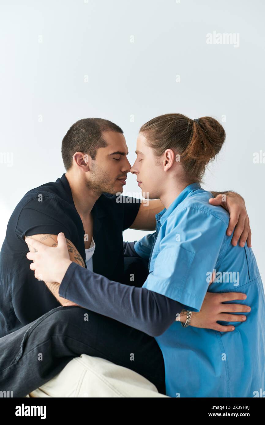 Two men hug each other tenderly Stock Photo - Alamy