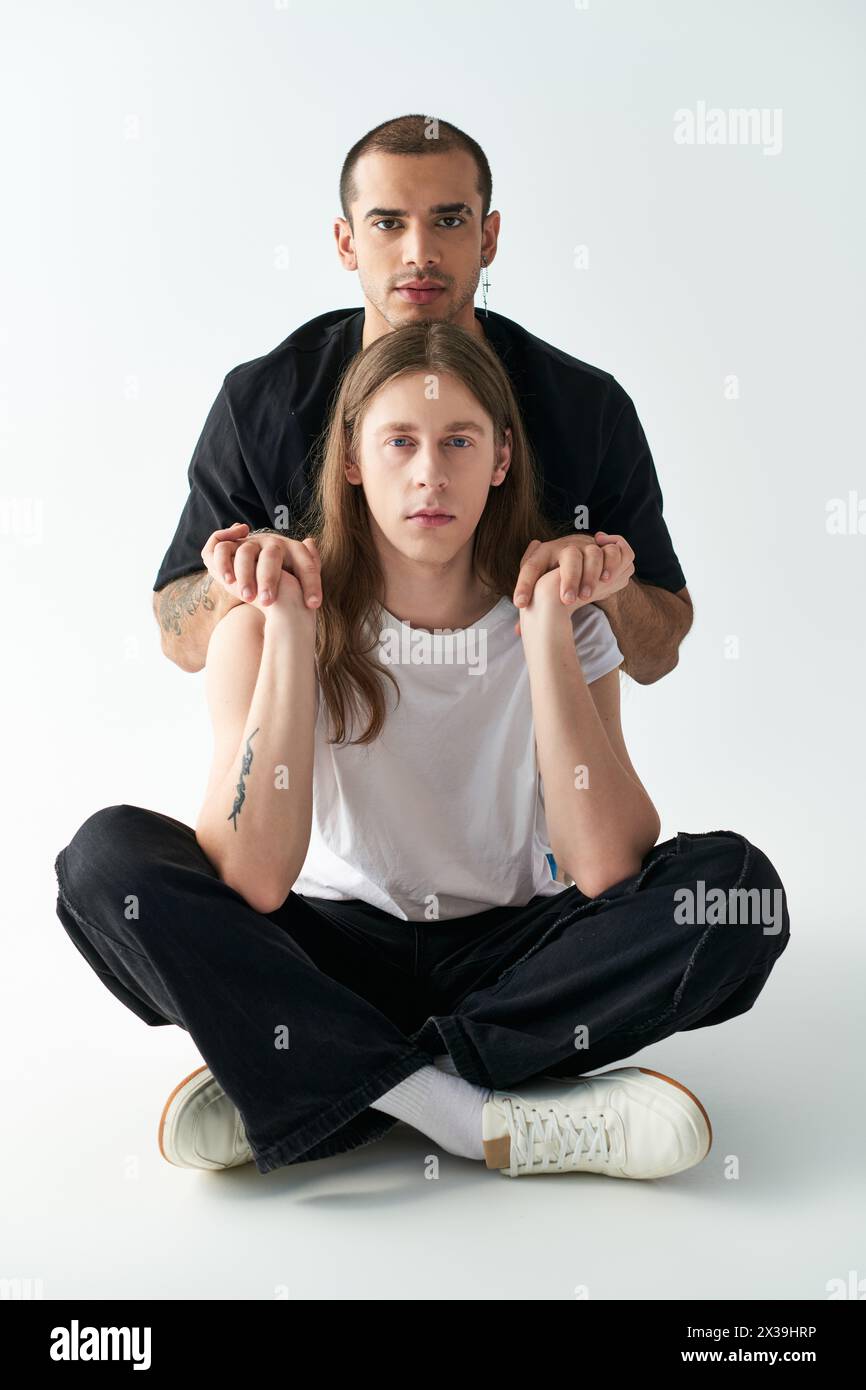 Two young gay men pose hi-res stock photography and images - Alamy