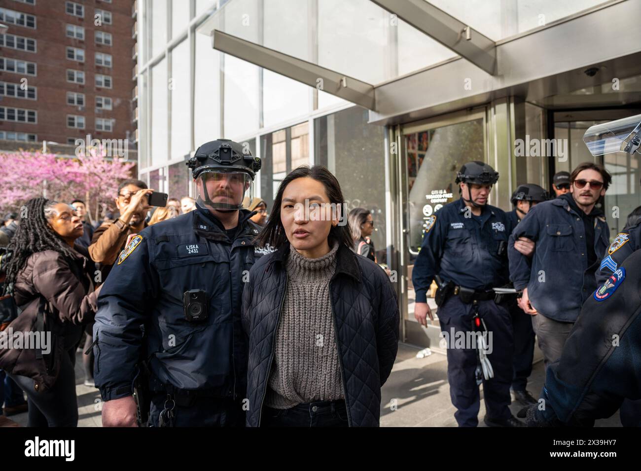 Environmental activists block the entrance to the headquarters of Citi ...