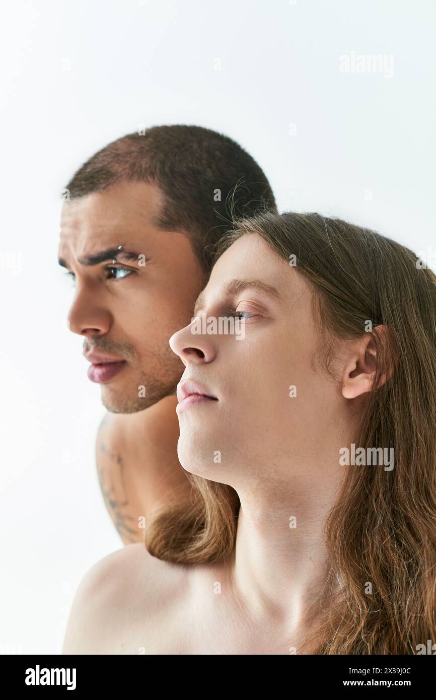 Two men share a tender moment, looking into each others eyes Stock ...