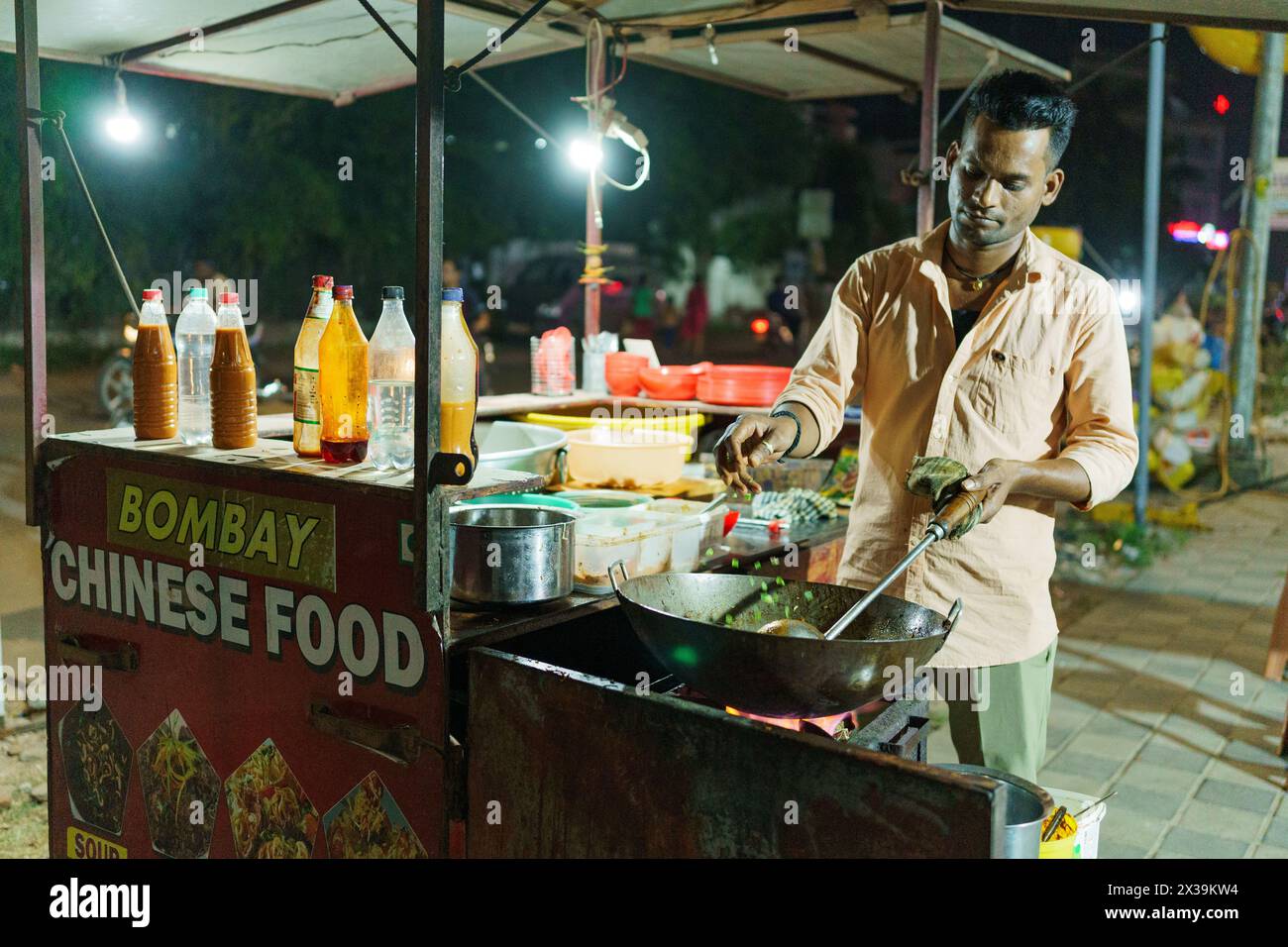 Mumbai, India - 20 October 2023: young street food vendor at a food ...