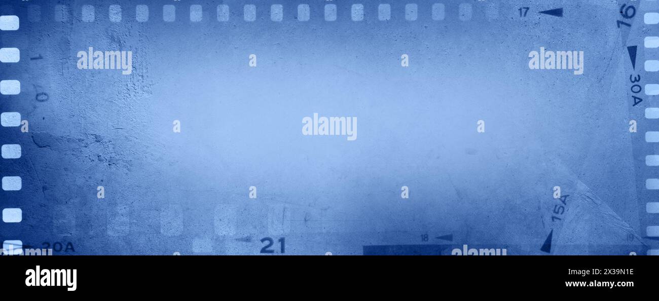 Film negatives frames blue background Stock Photo - Alamy