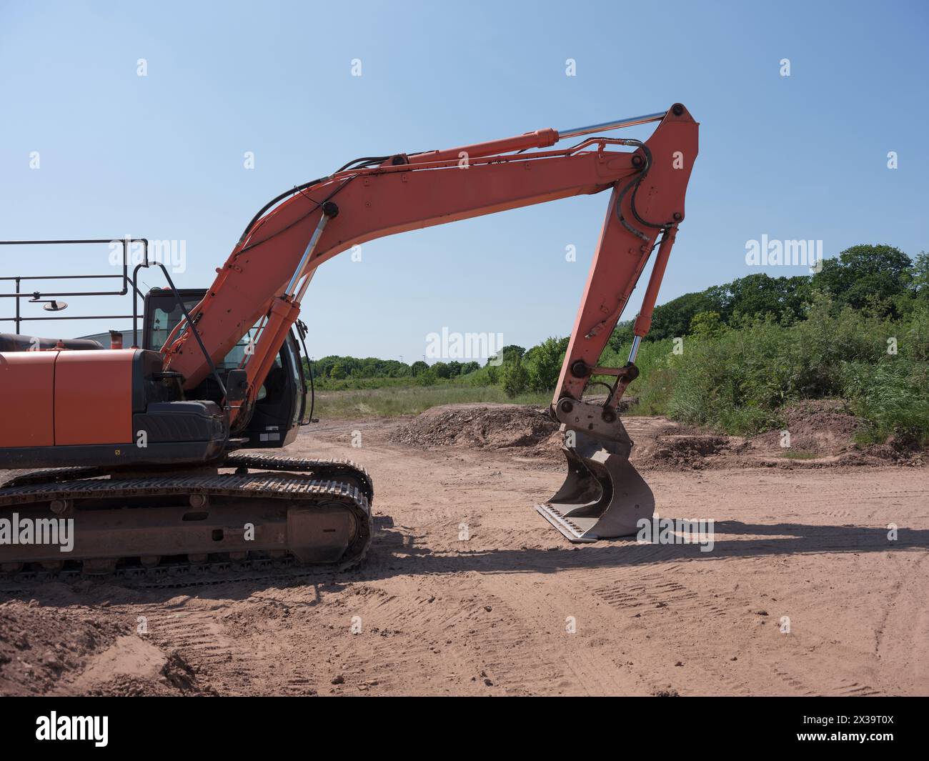 Excavator on a new industrial development site Stock Photo - Alamy