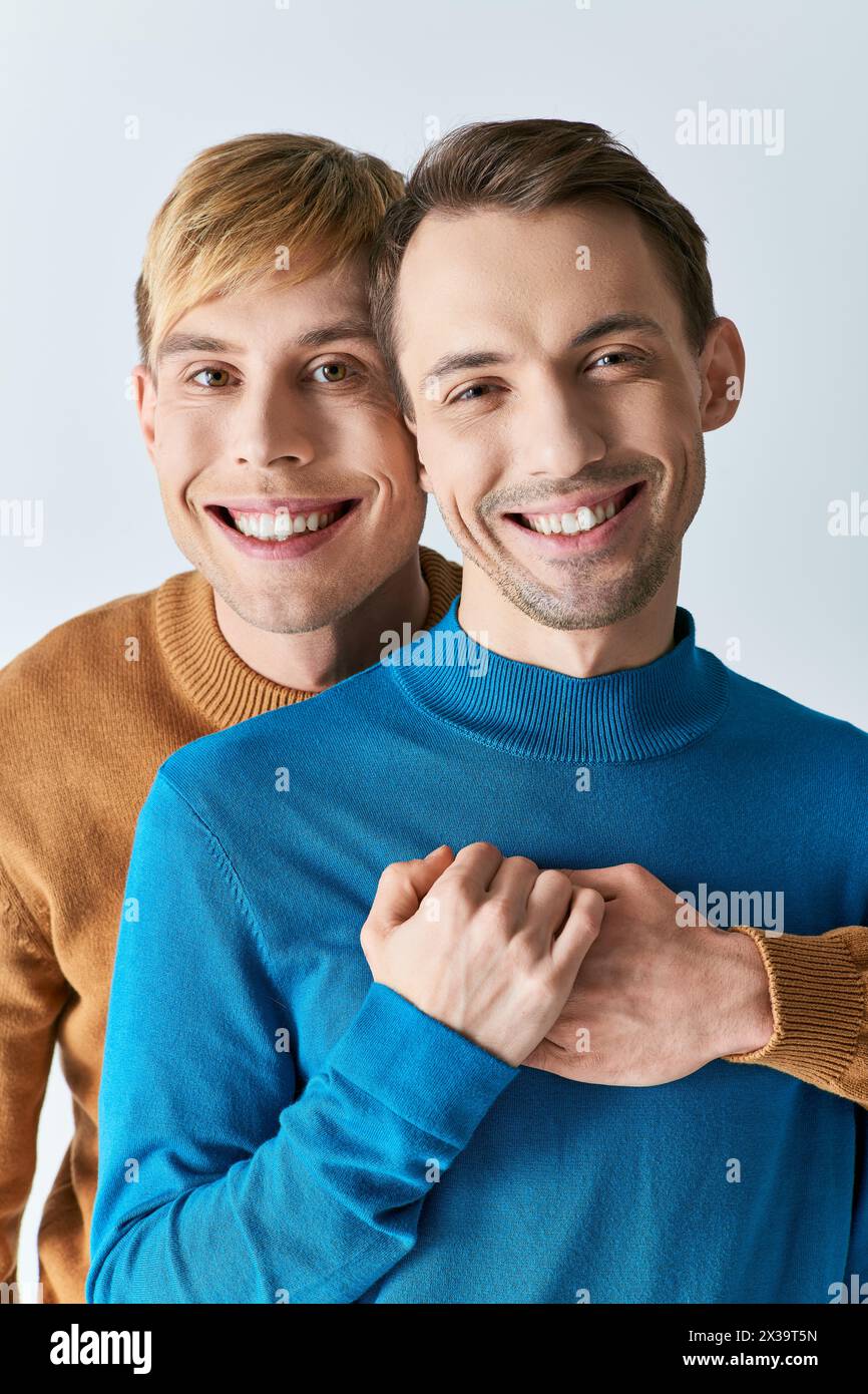Men embracing men hi-res stock photography and images - Alamy
