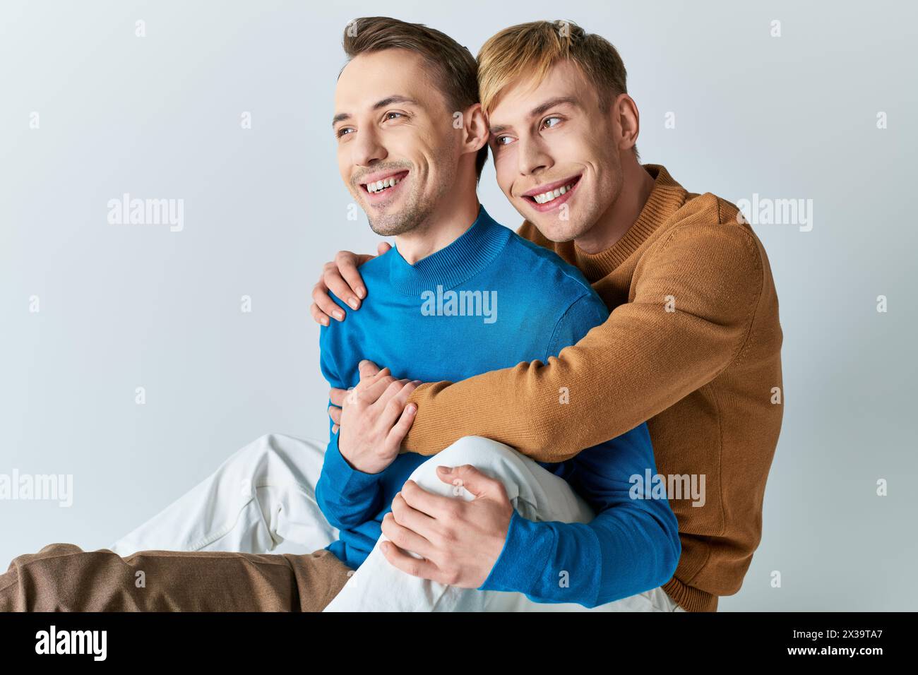 Gay men hugging hi-res stock photography and images - Alamy