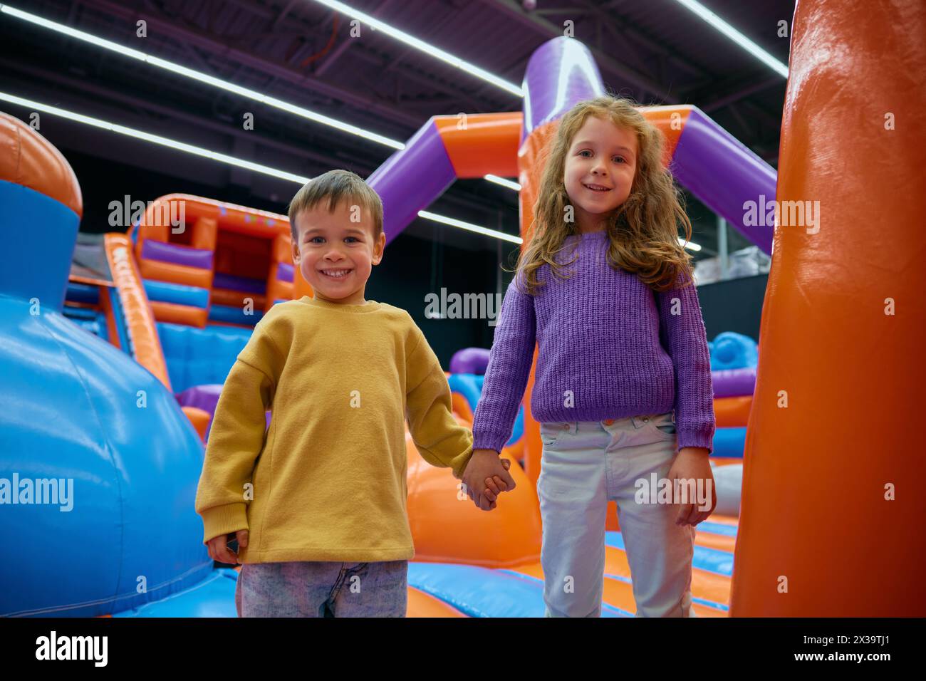 Children playing in bounce house hi-res stock photography and images ...