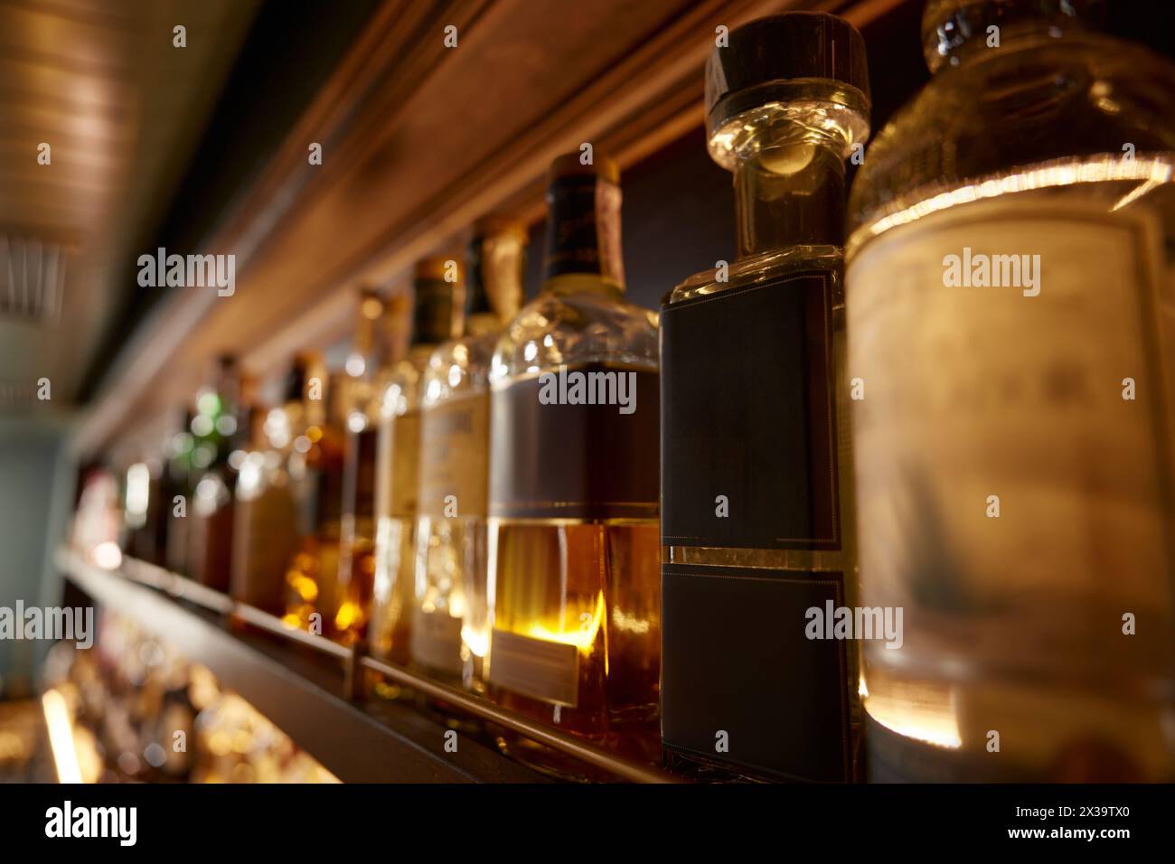 Bar counter with many bottles of alcoholic drinks assortment Stock ...