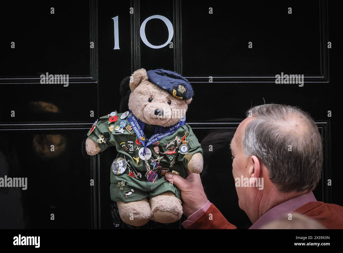London, UK. 25th Apr, 2024. Richard Bland, founder Bear Force, holds ...