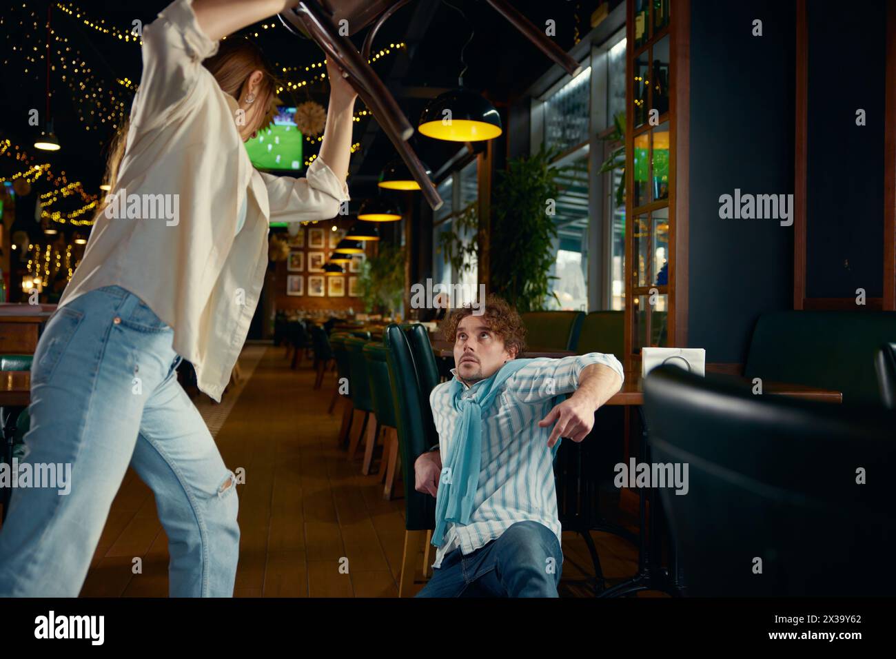 Man and woman and bar and fight hi-res stock photography and images - Alamy