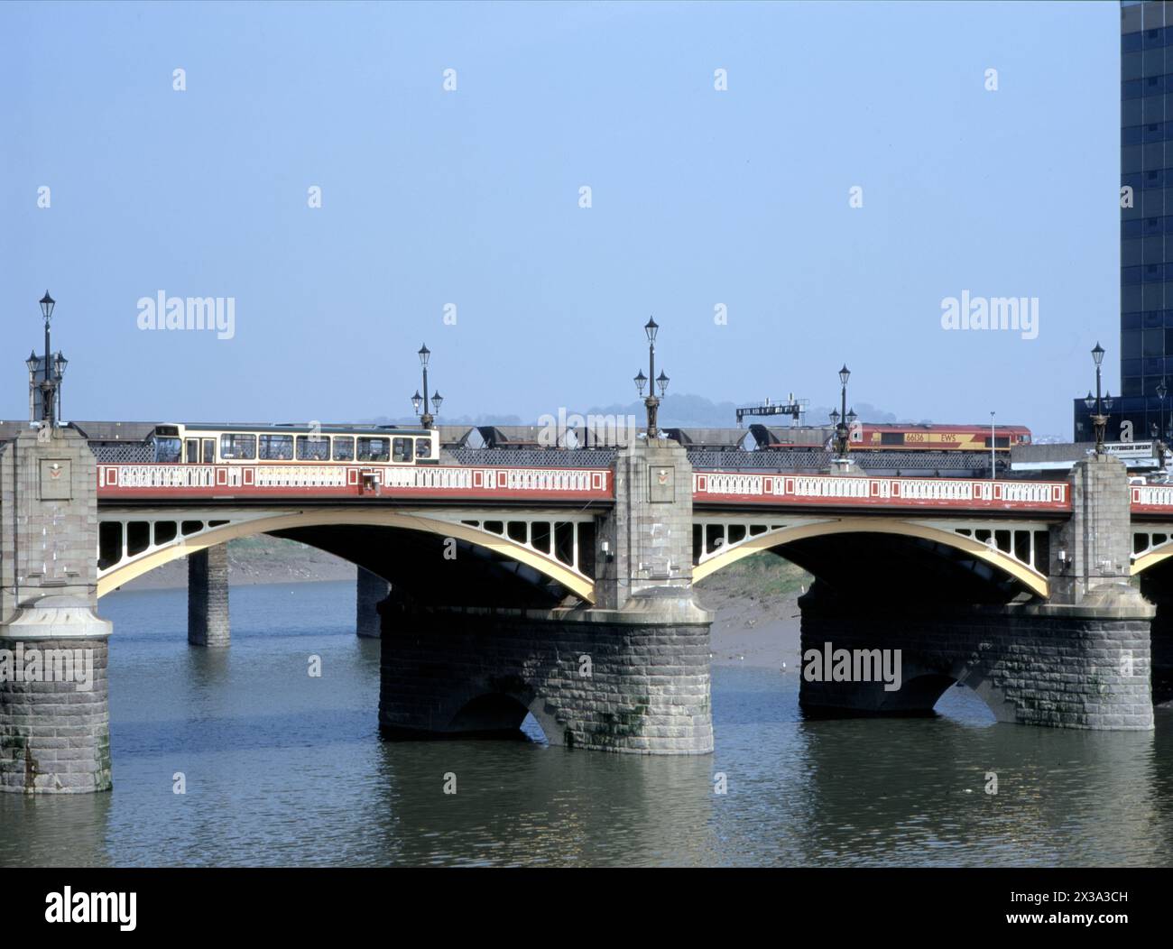 Newport bus crossing Town Bridge, which crosses at Newport Castle, with ... Newport bus crossing Town Bridge, which crosses at Newport Castle, with ...