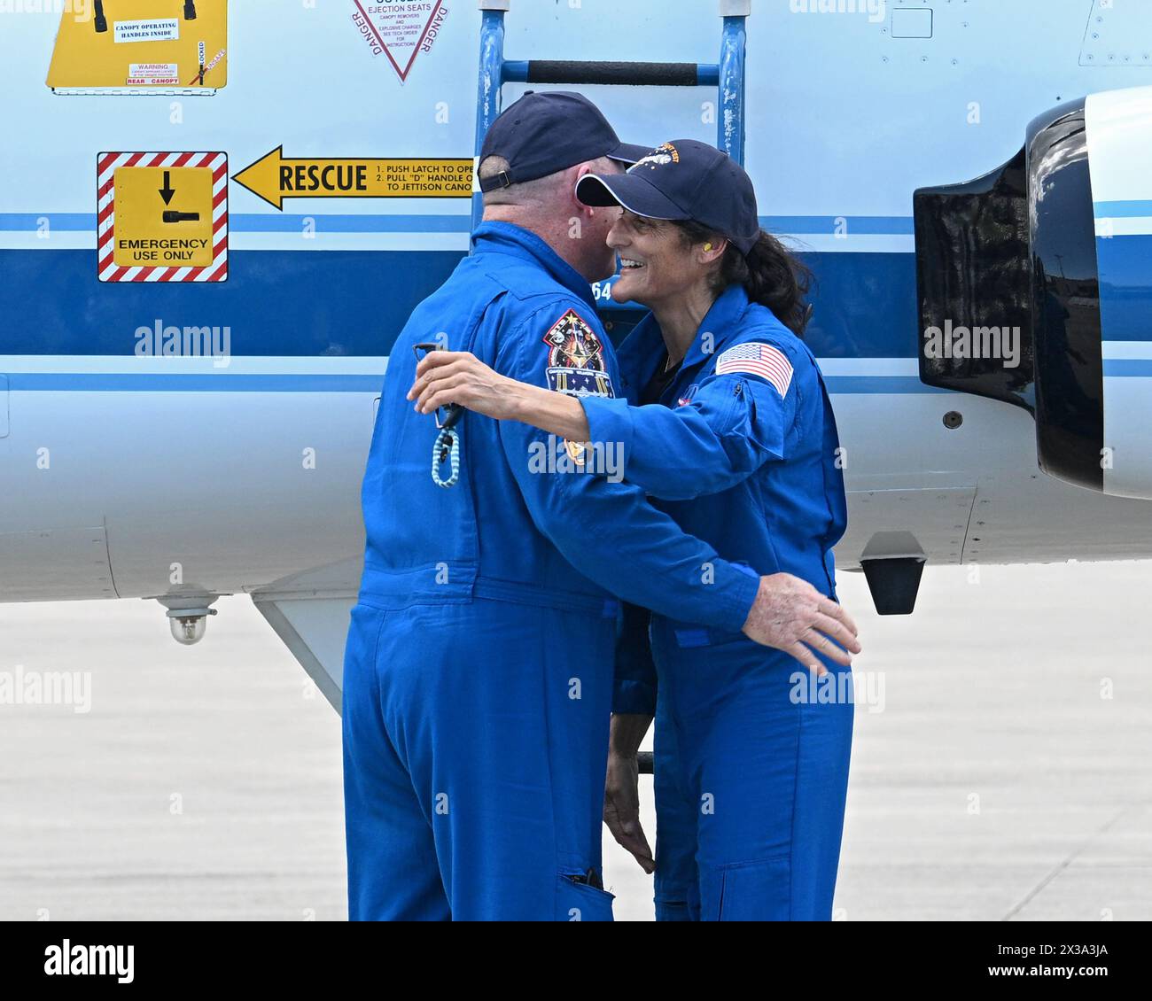 NASA Astronauts Butch Wilmore and Suni Williams hug after arriving at ...