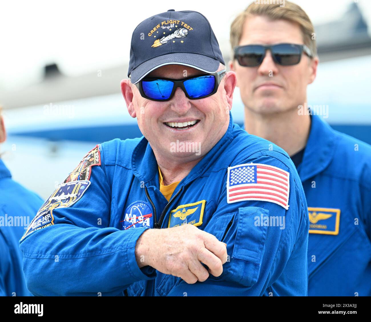 NASA Astronaut Butch Wilmore smiles after arriving at the Kennedy Space ...