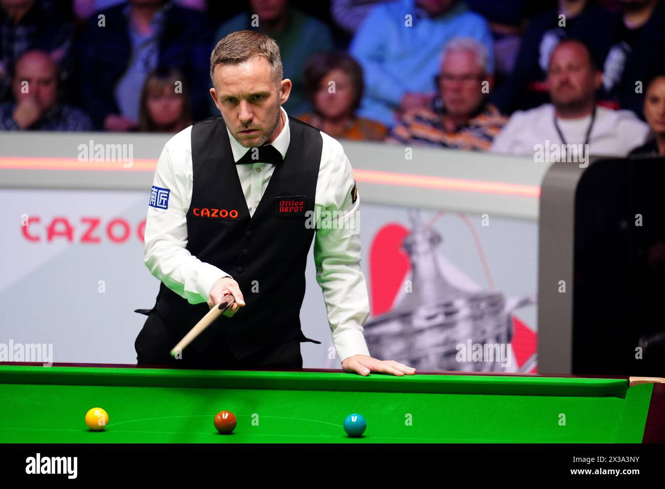 Jamie Jones in action during the match against John Higgins on day six ...