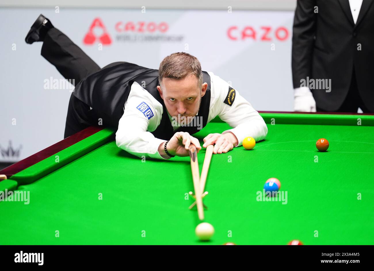 Jamie Jones in action during the match against John Higgins on day six ...