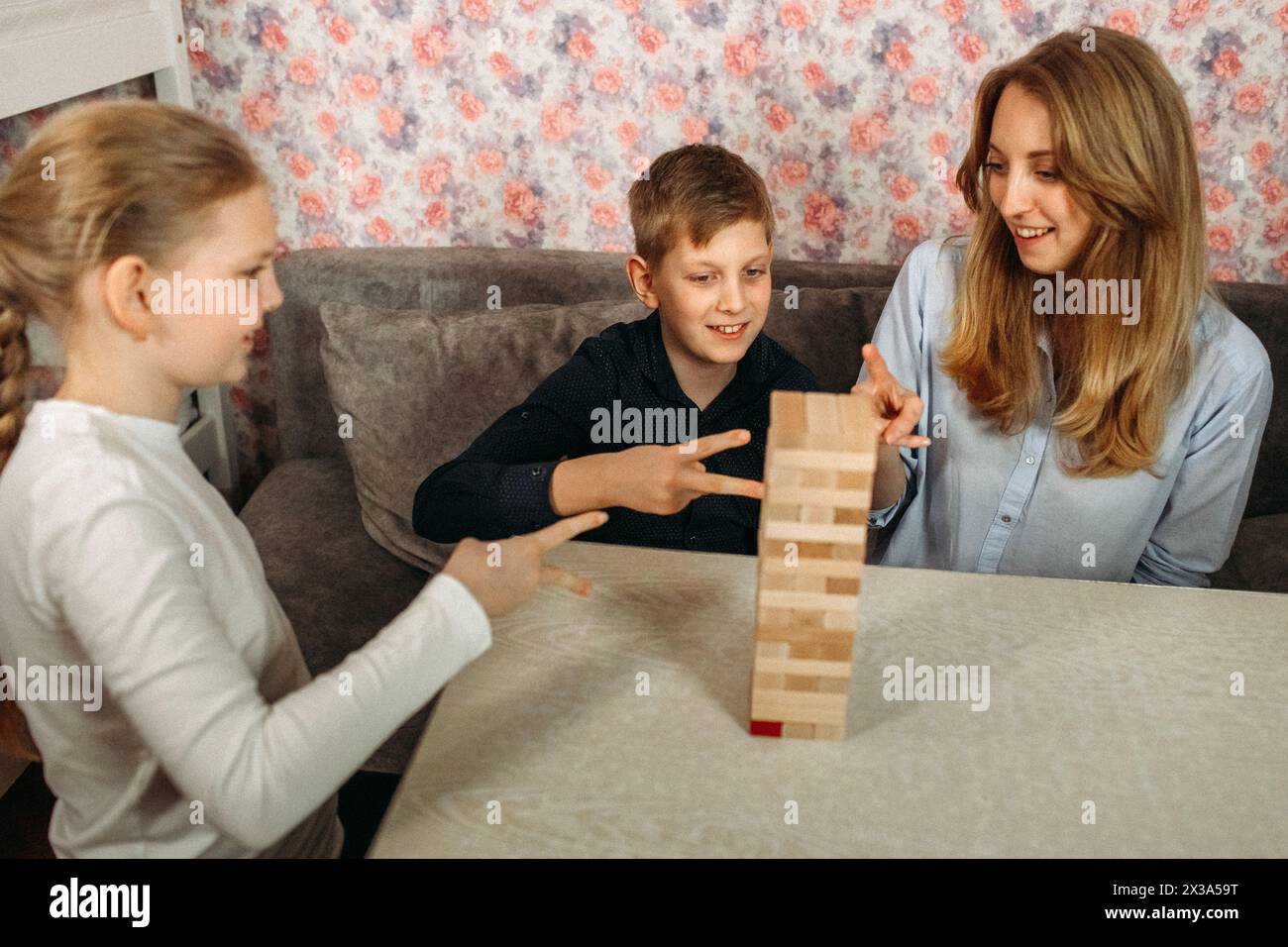 Family bonding children building tall hi-res stock photography and ...