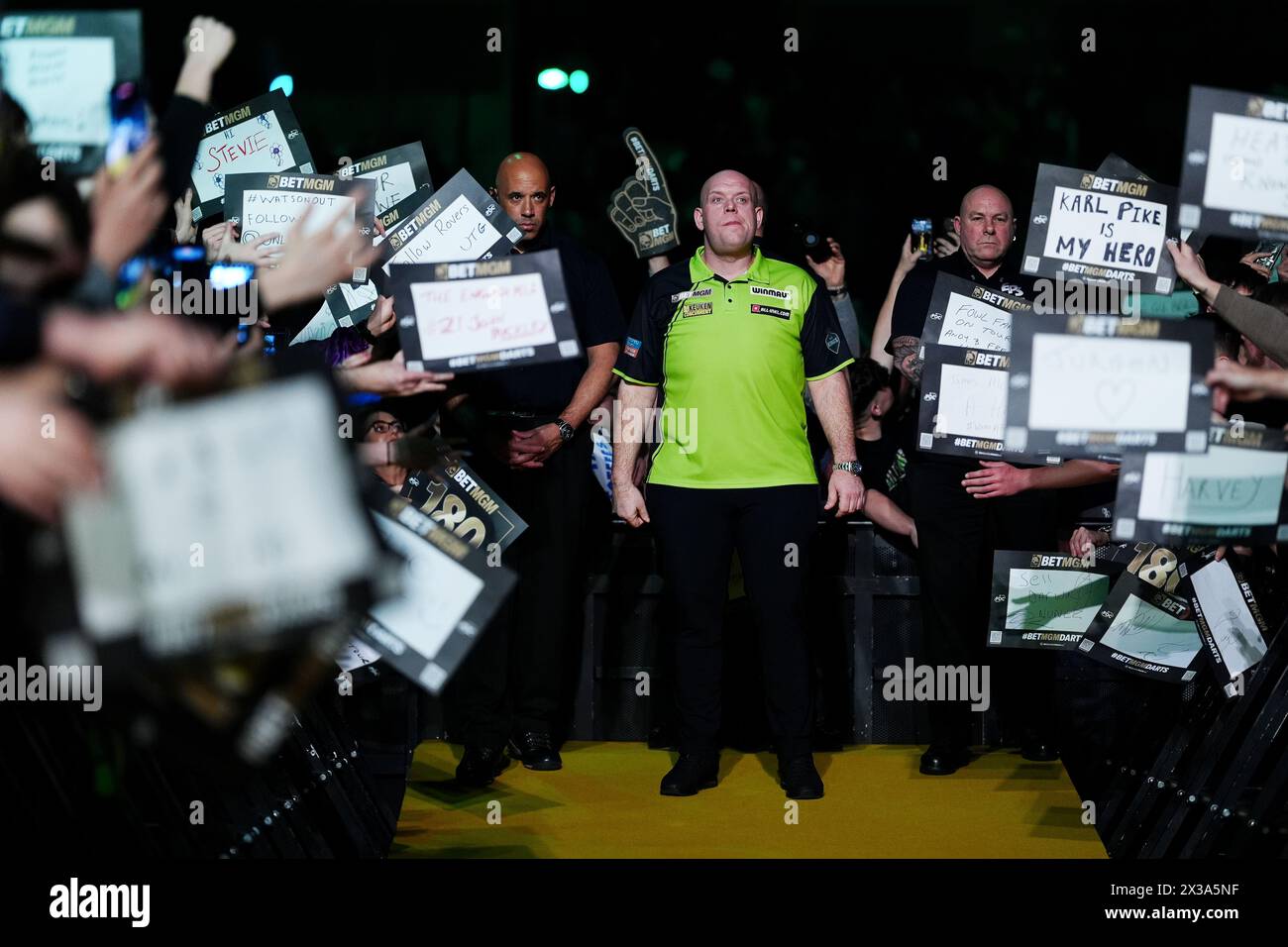 Michael van Gerwen walks out to play Peter Wright (not pictured) on ...