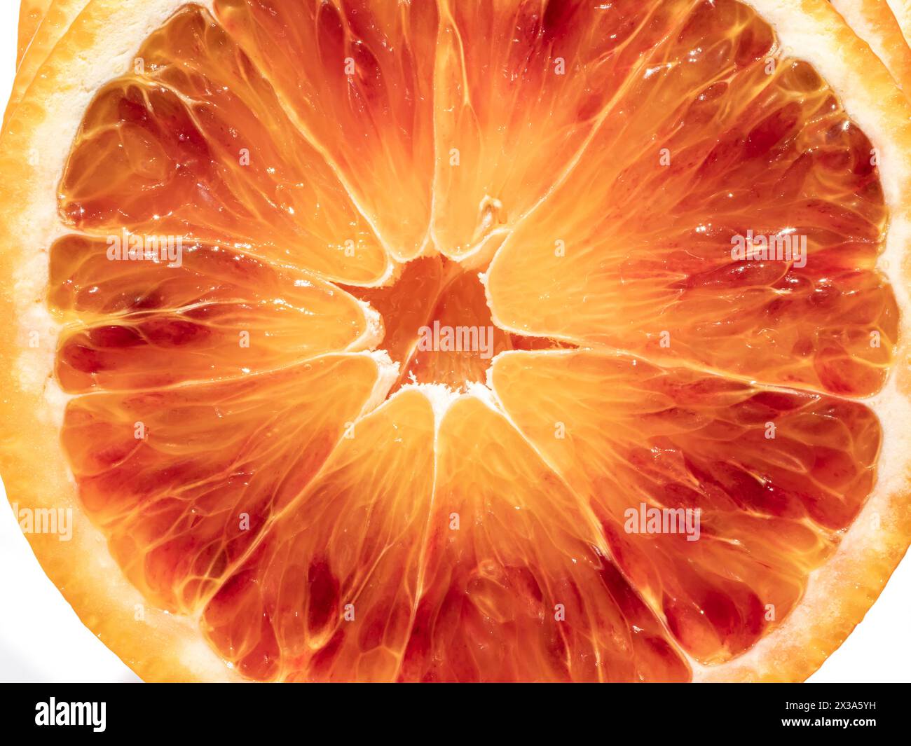 Red orange slice on white background Stock Photo - Alamy