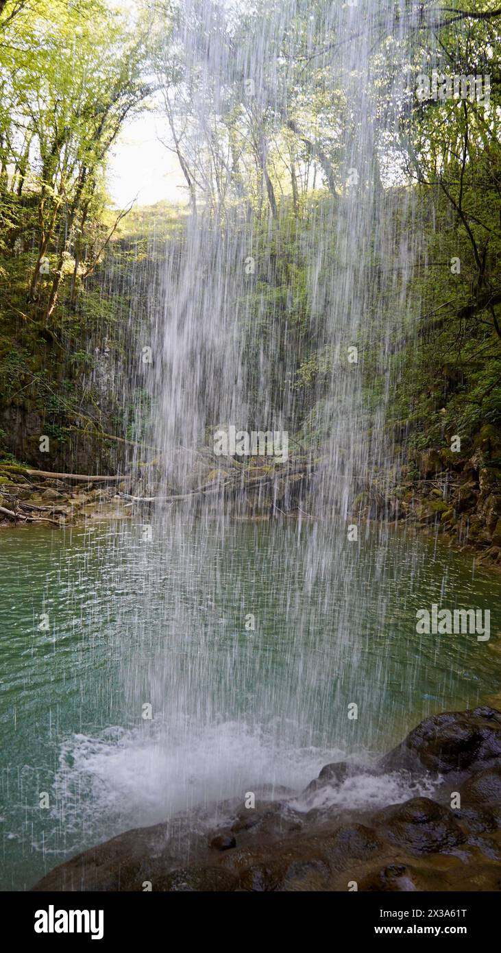 A vertical shot of Waterfall Butori with a lake on background in Istria ...