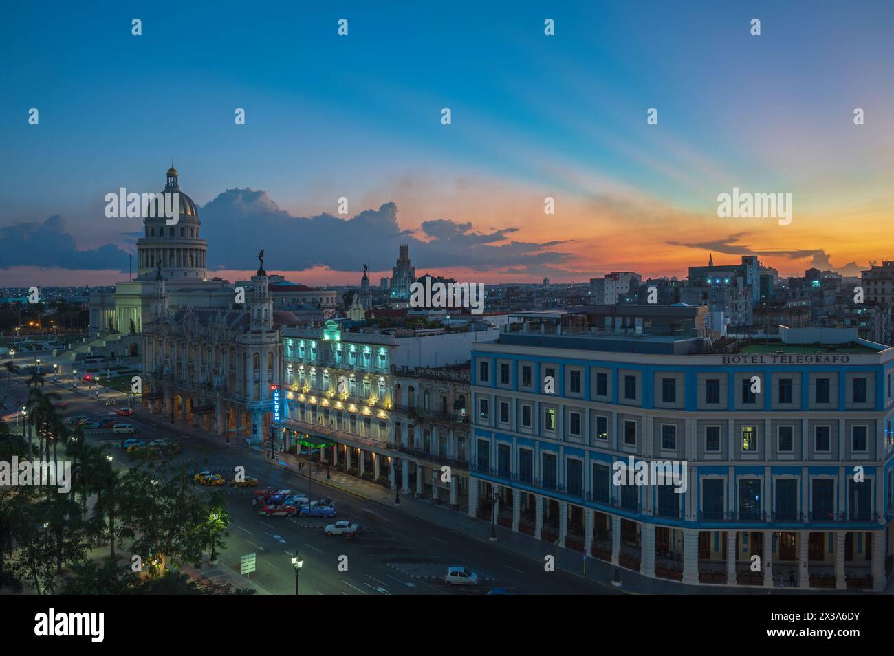 A night time view across Central park, Havana, Cuba, showing the mix of ...