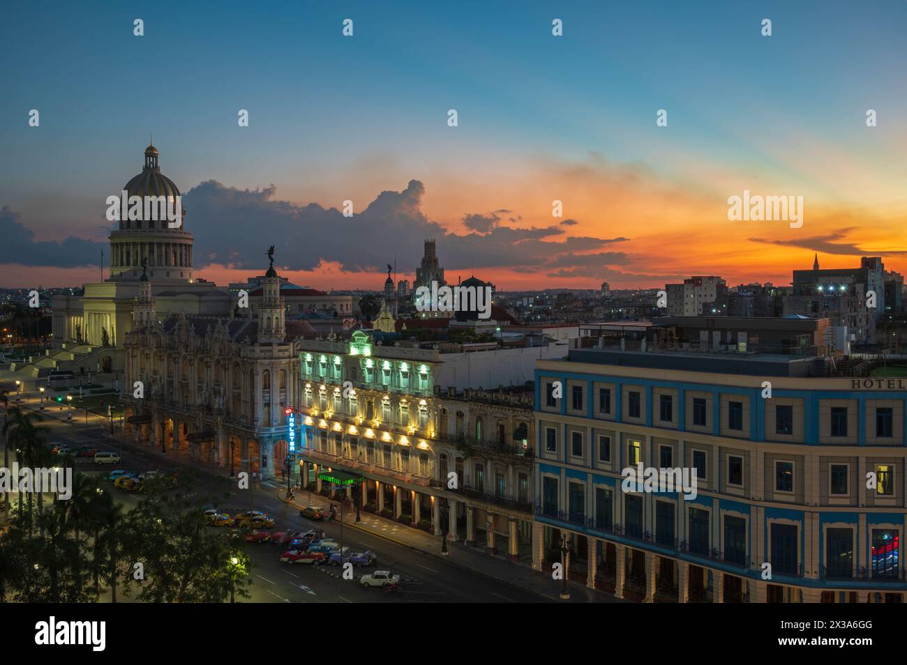 A night time view across Central park, Havana, Cuba, showing the mix of ...
