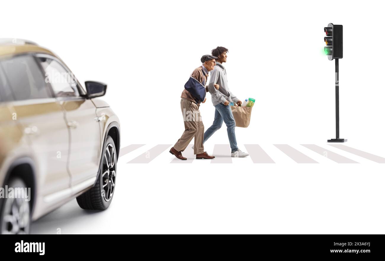 African american young man helping an injured elderly man with grocery ...