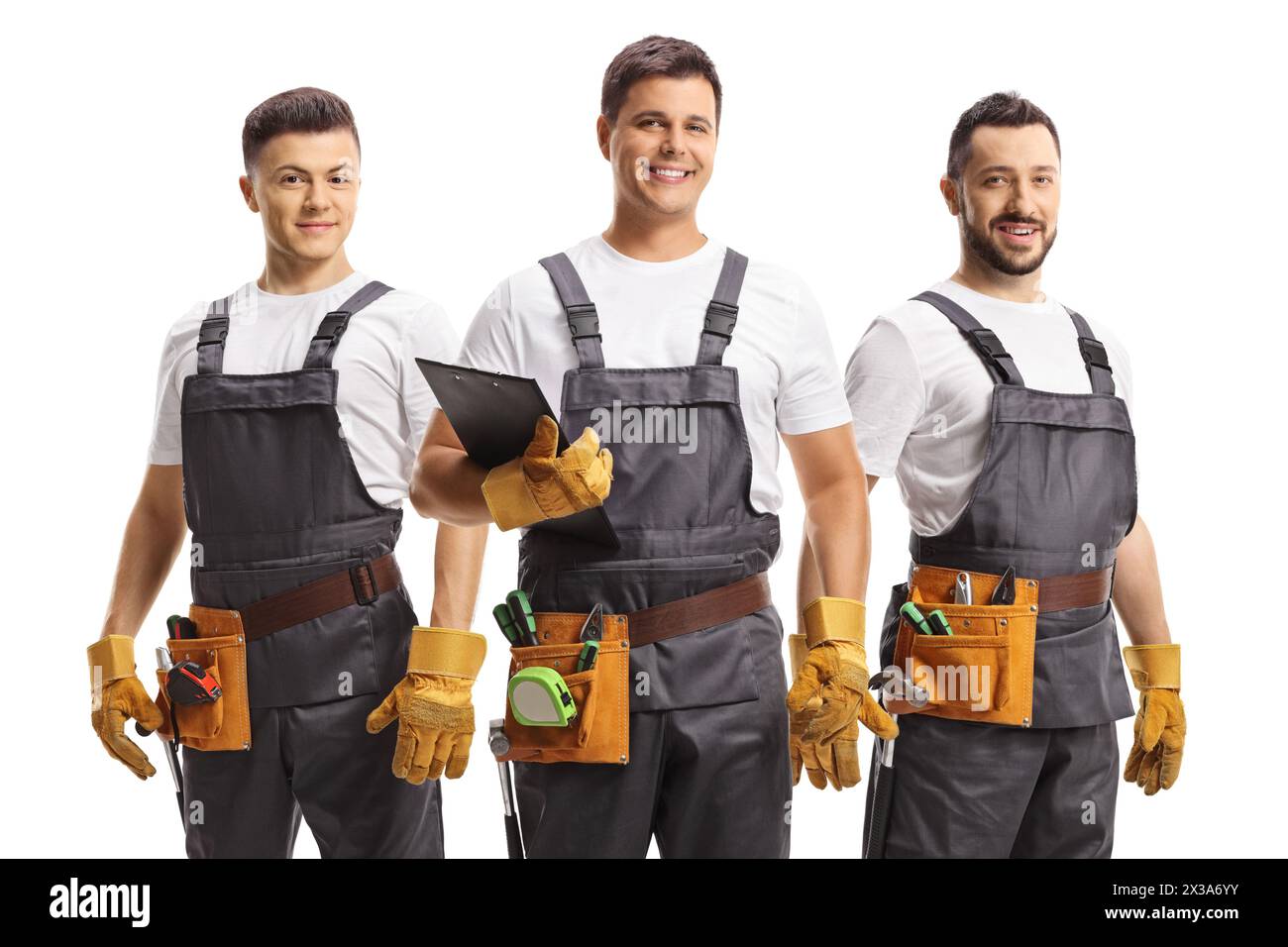 Team of service workers with tool belts isolated on white background ...