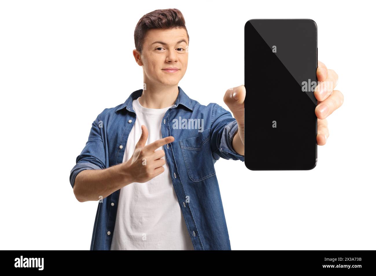 Happy smartphone user pointing at a blue screen isolated on white ...