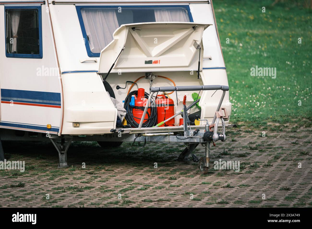 there are two gas cylinders in the storage space of a caravan Stock ...