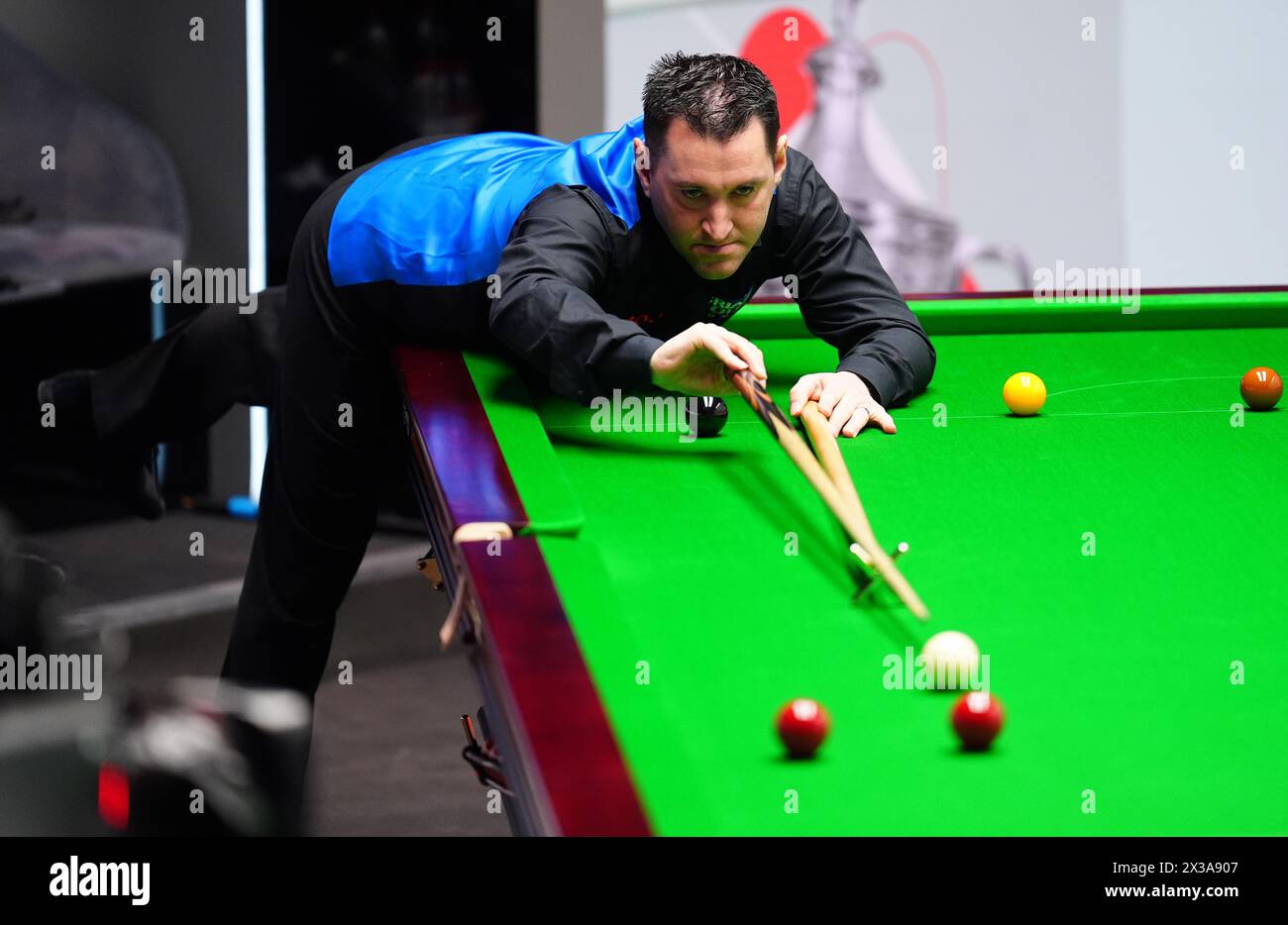 Tom Ford in action against Judd Trump on day six of the 2024 Cazoo ...