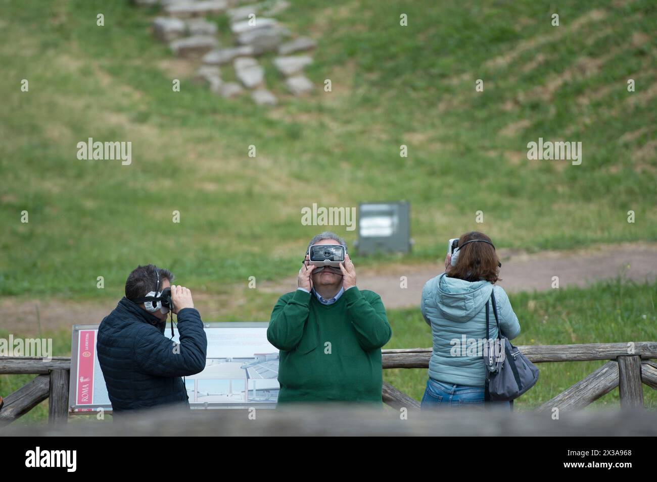 Rome, Italy. 25th Apr, 2024. Tourists with augmented reality viewers ...