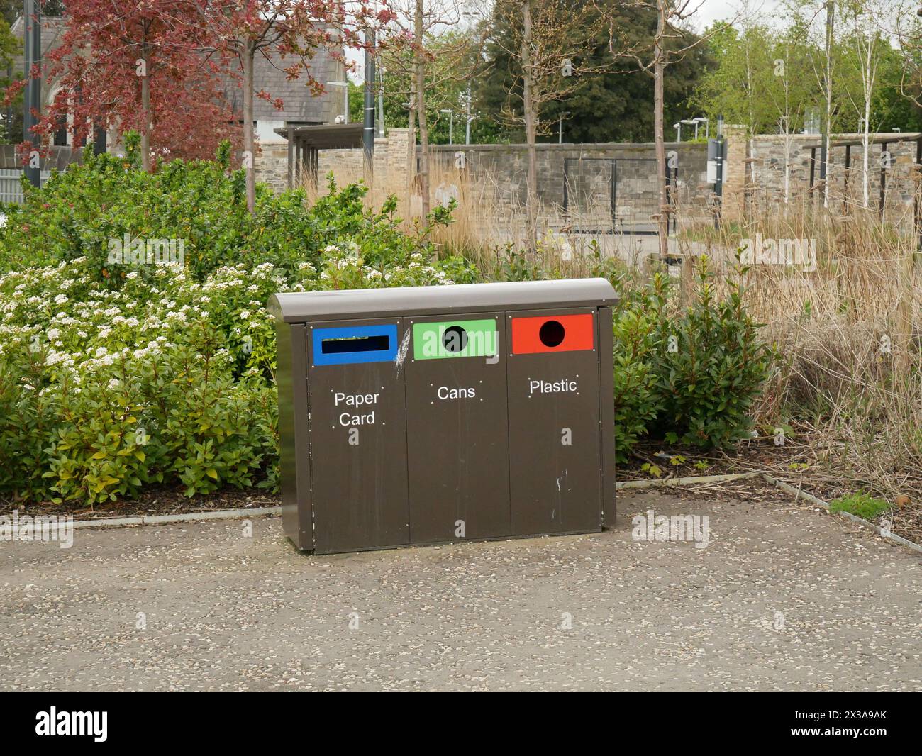 Recycling bins outside Stock Photo - Alamy