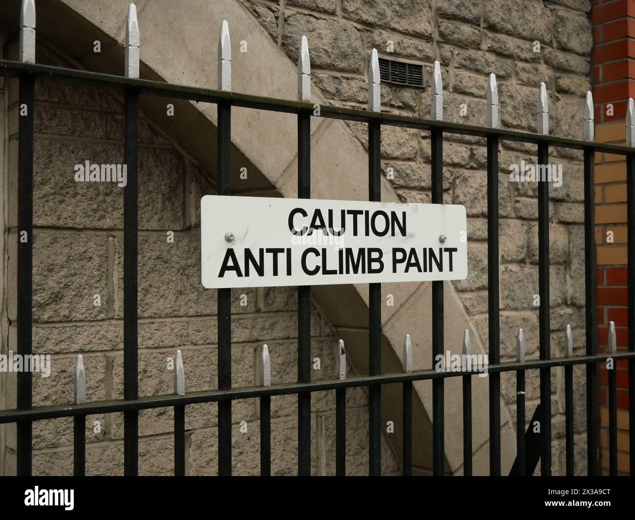 Anti Climb Paint Sign Stock Photo - Alamy