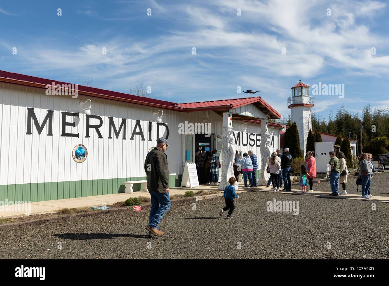 Visitors queue up at the International Mermaid Museum during the ...