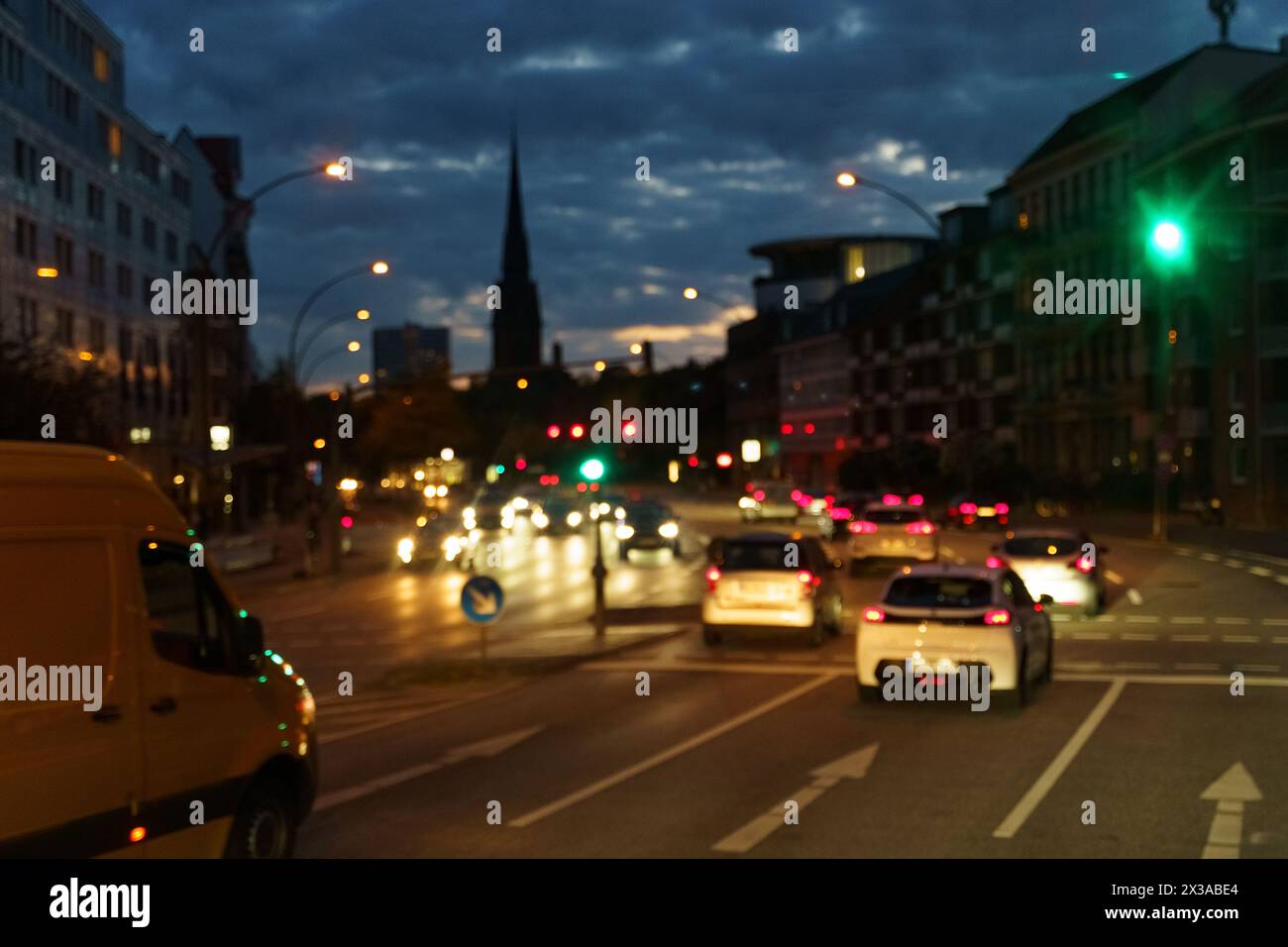 Hamburg, Germany - May 19, 2023: A city street at night filled with ...
