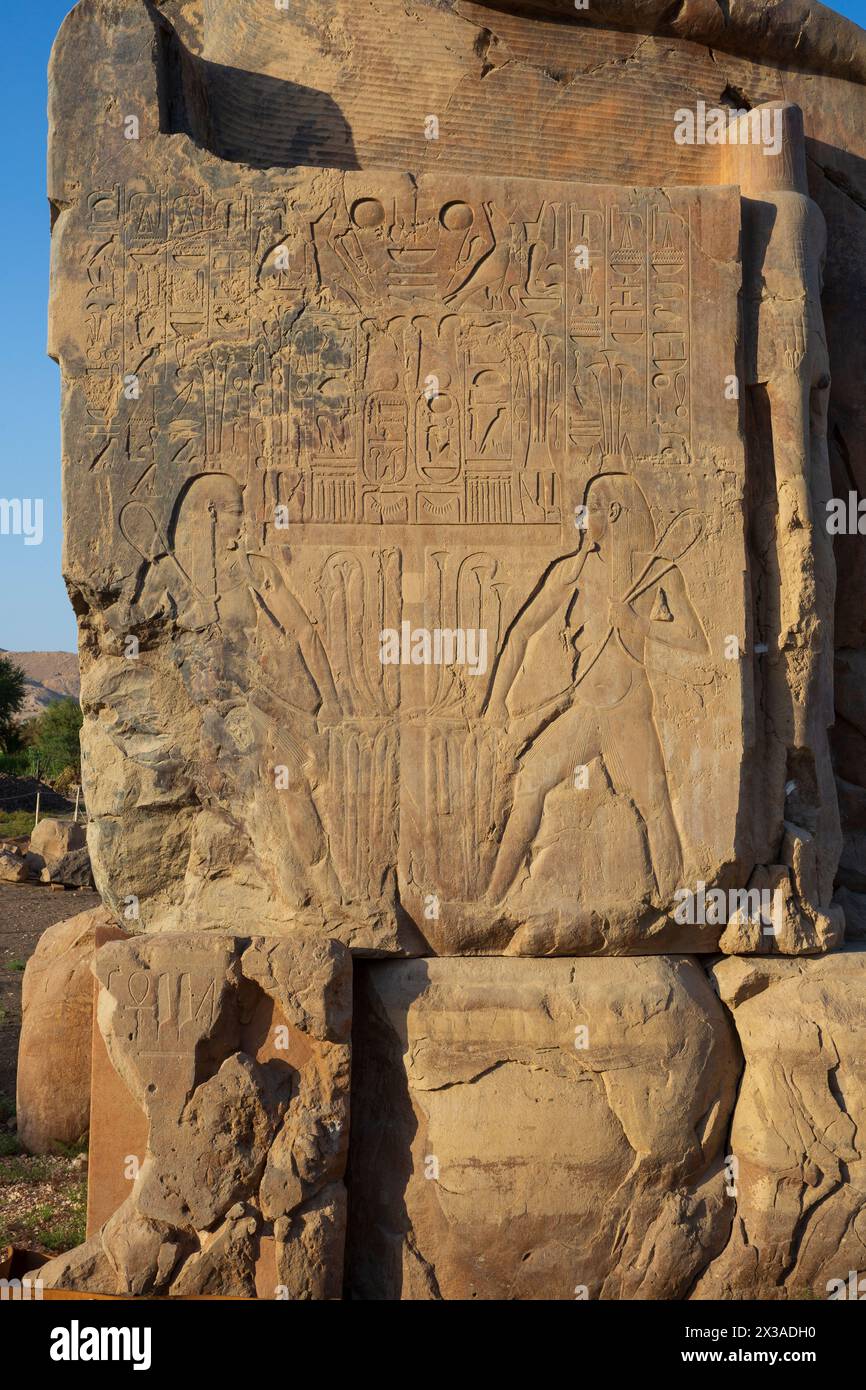 A side panel with two flanked relief images of the deity Hapi on one of ...
