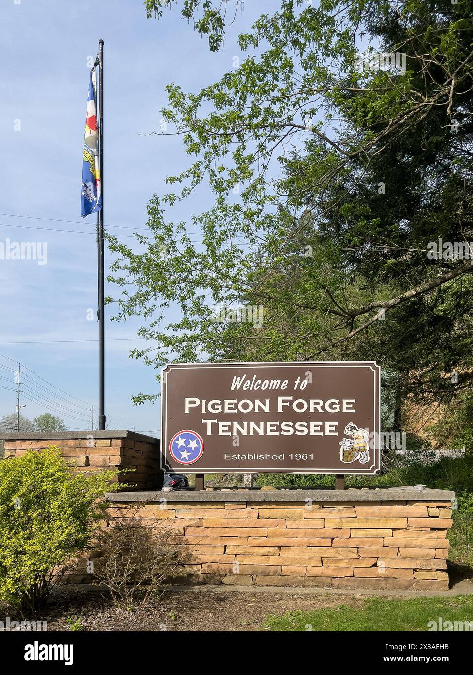 A Welcome to Pigeon Forge sign as guests are entering the city towards ...