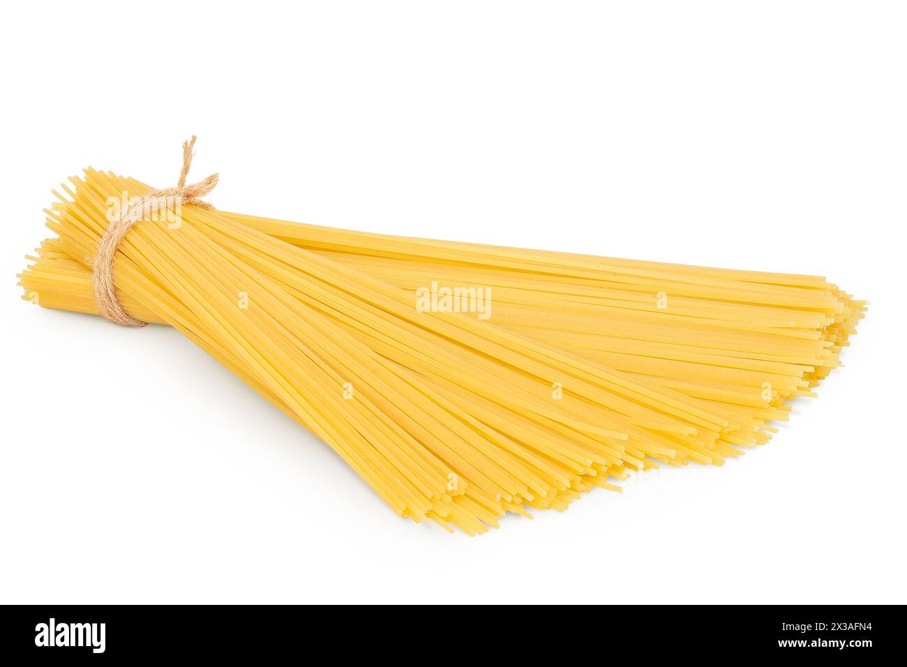uncooked spaghetti or yellow pasta isolated on white background Stock ...