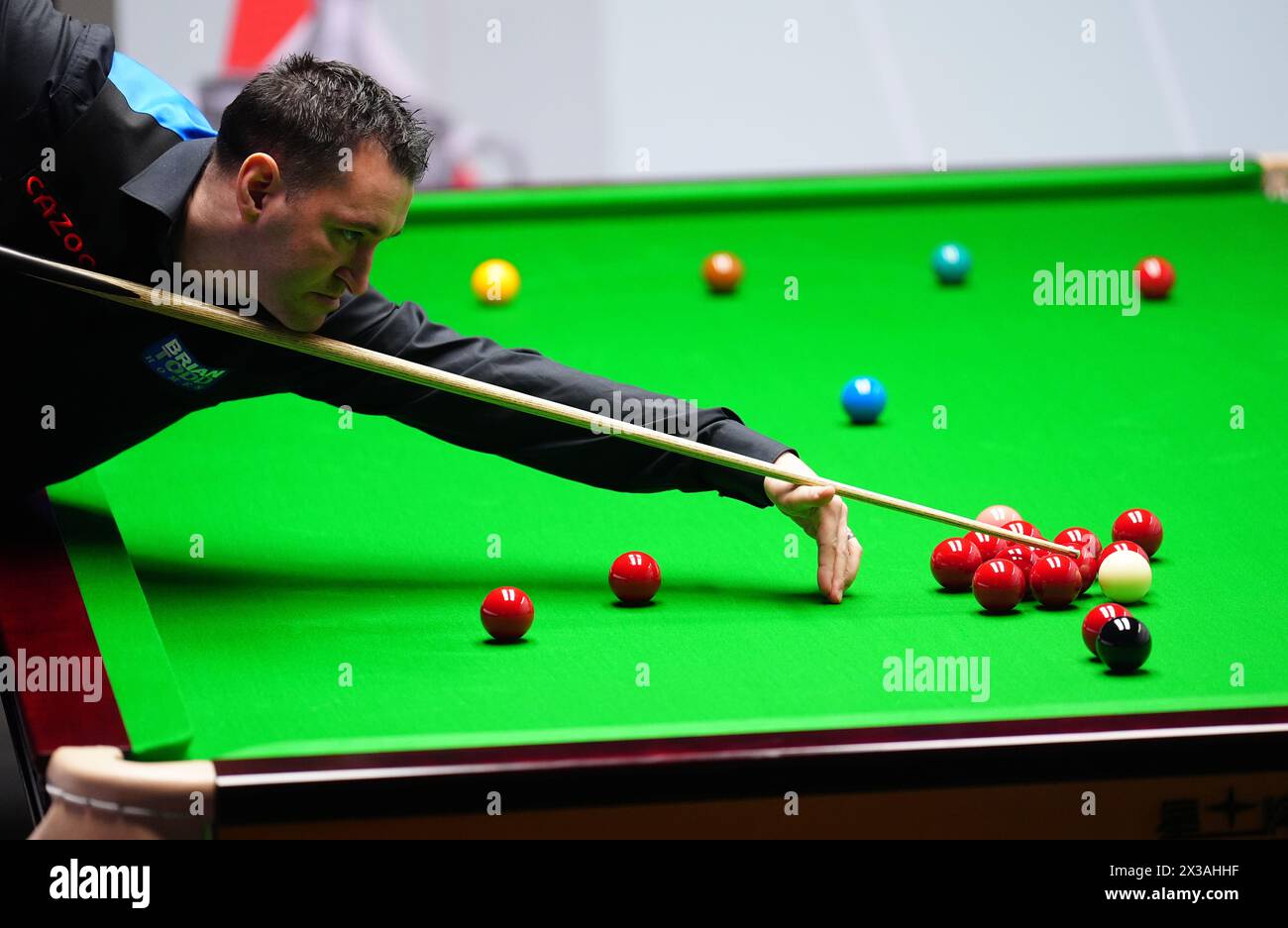 Tom Ford in action against Judd Trump on day six of the 2024 Cazoo ...