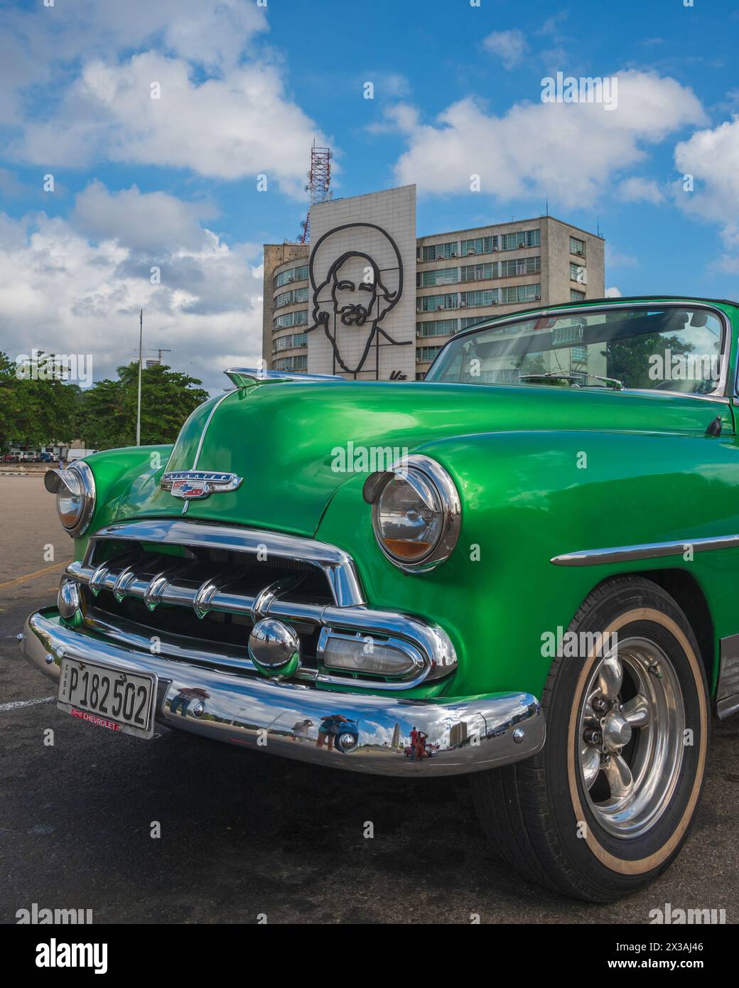 A restored classic American Chevrolet parked in Plaza de la Revolucion ...